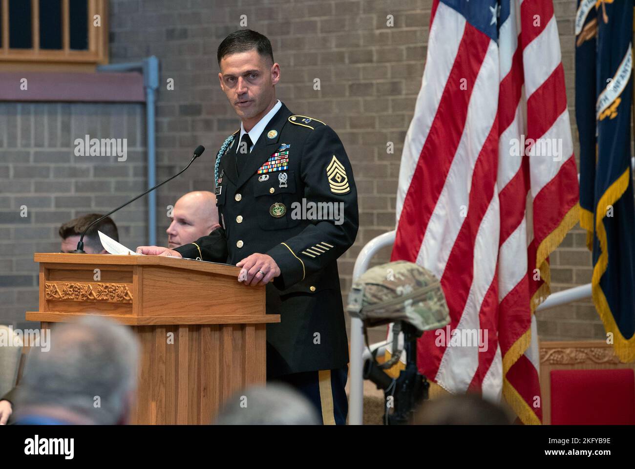 First Sgt. Matthew Sanders looks at the Family of Staff Sgt. Timothy ...