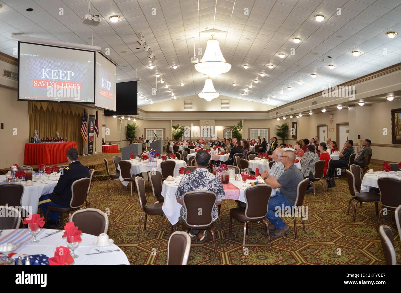 Attendees watch a video during the Robertson Blood Center annual Blood ...