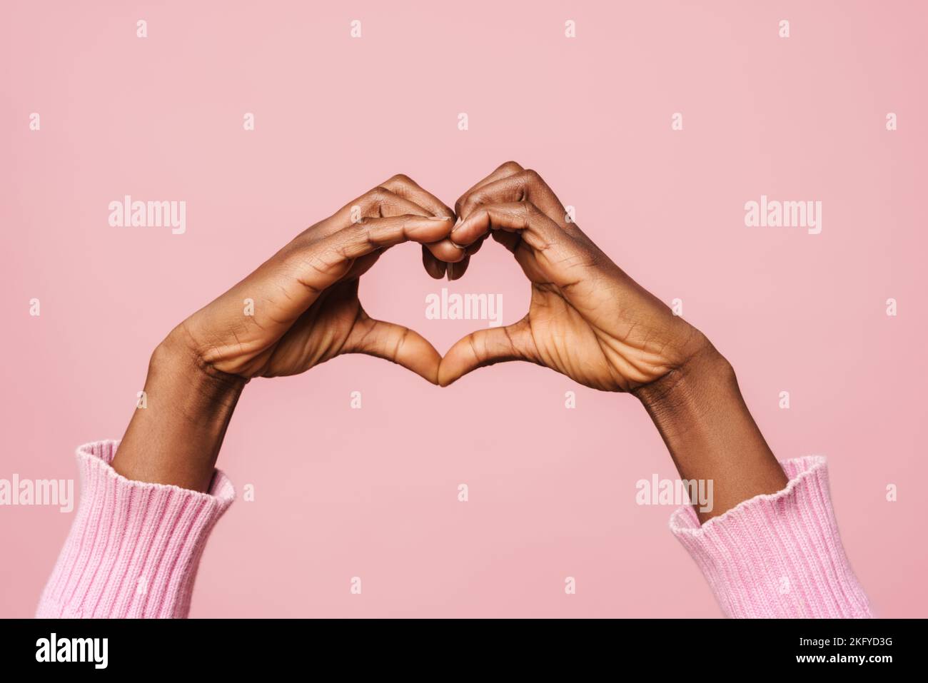 Black woman hand over heart hi-res stock photography and images - Alamy