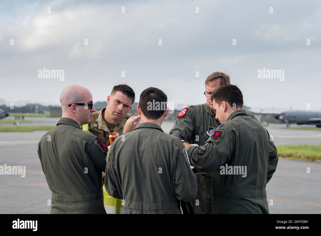 U.S. Airmen from the 909th Air Refueling Squadron sync up before their ...