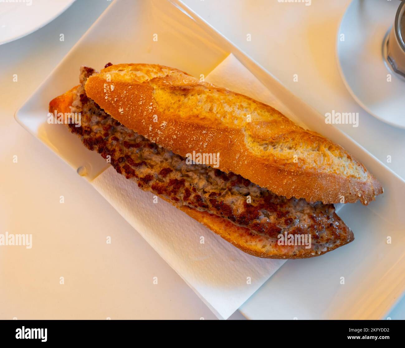 Hot sandwich with Longaniza sausage with sauce Stock Photo - Alamy