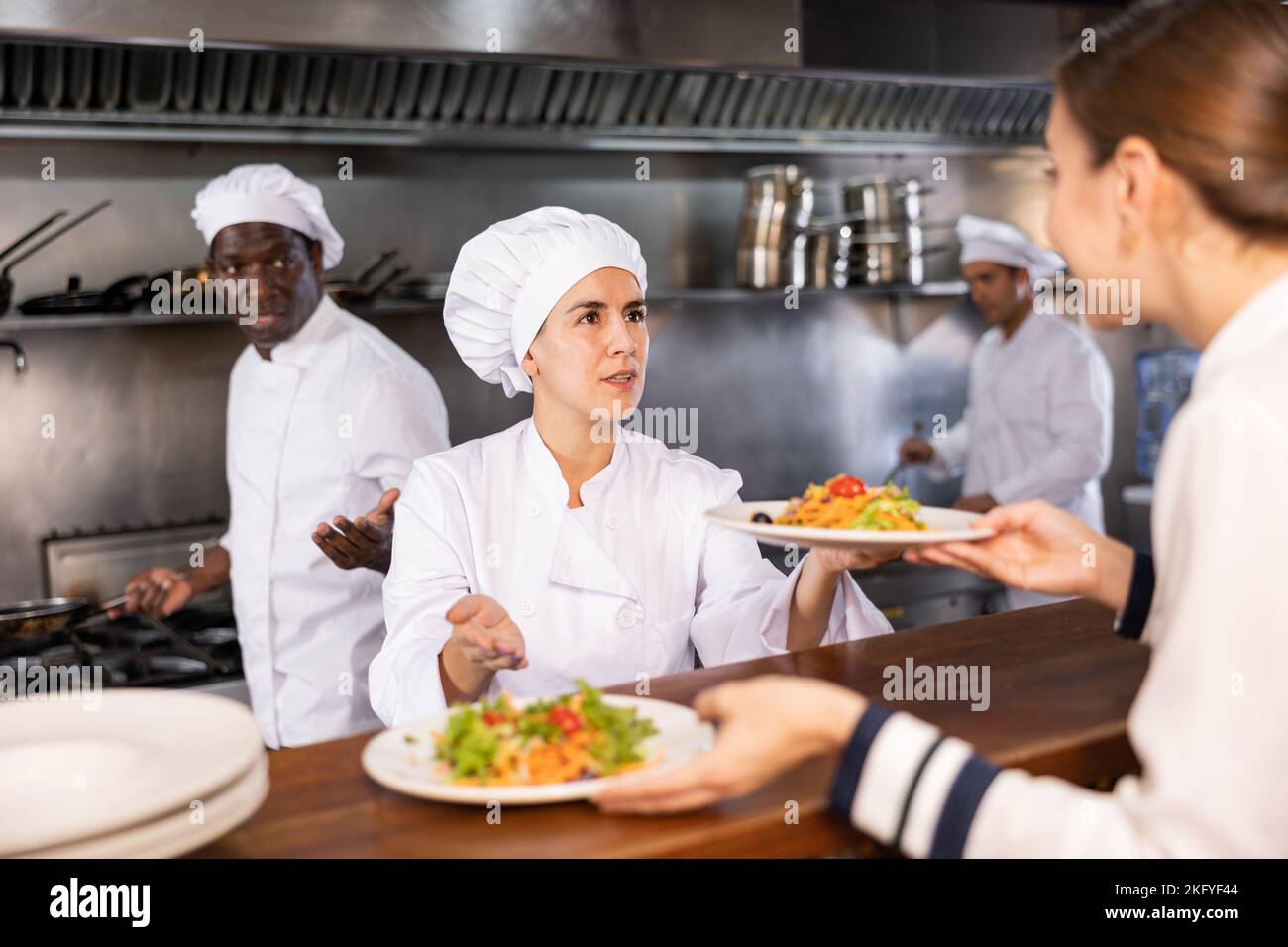 Waitress counter giving food hi-res stock photography and images - Alamy