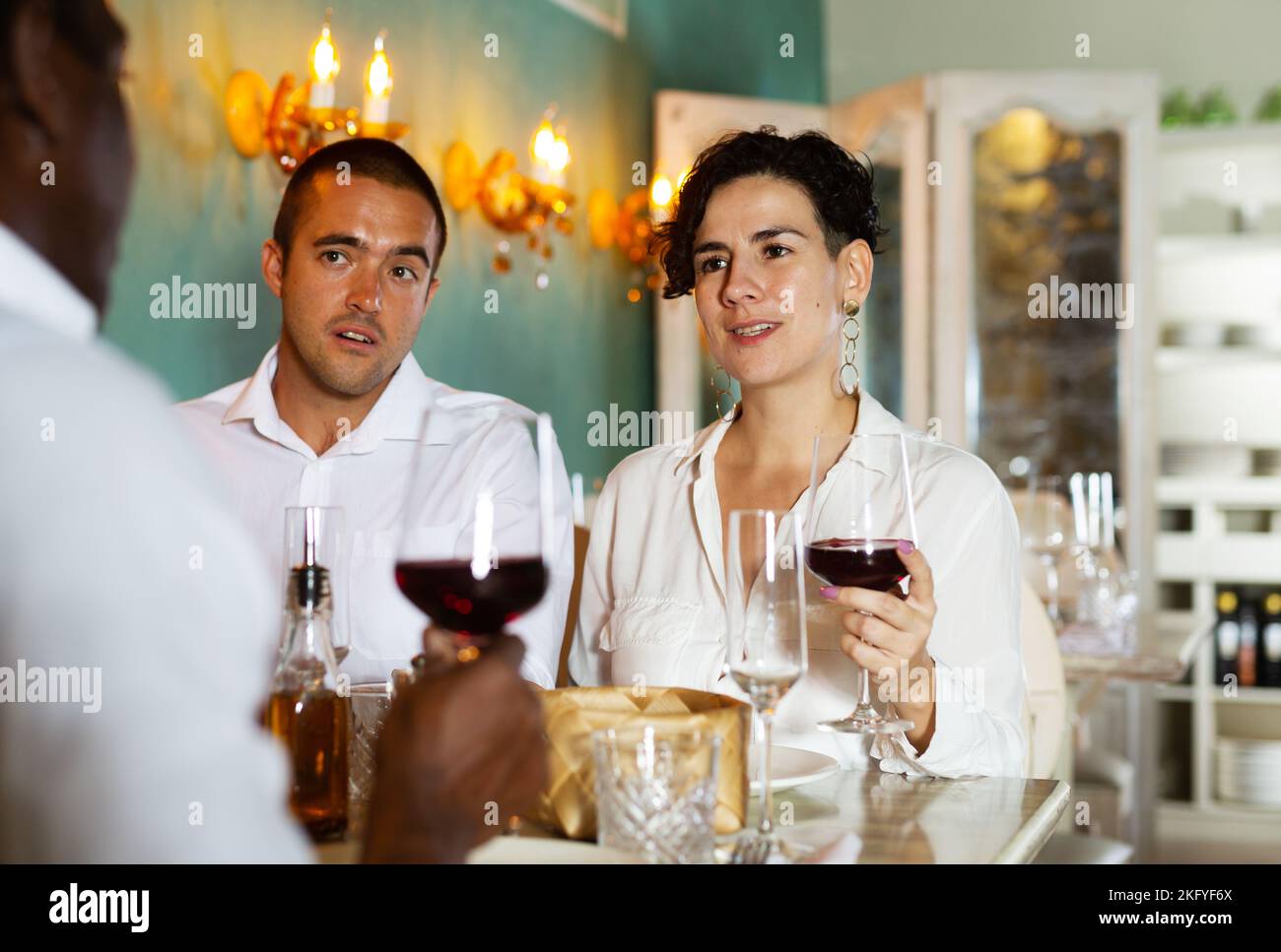 Man and friends in the restaurant Stock Photo - Alamy
