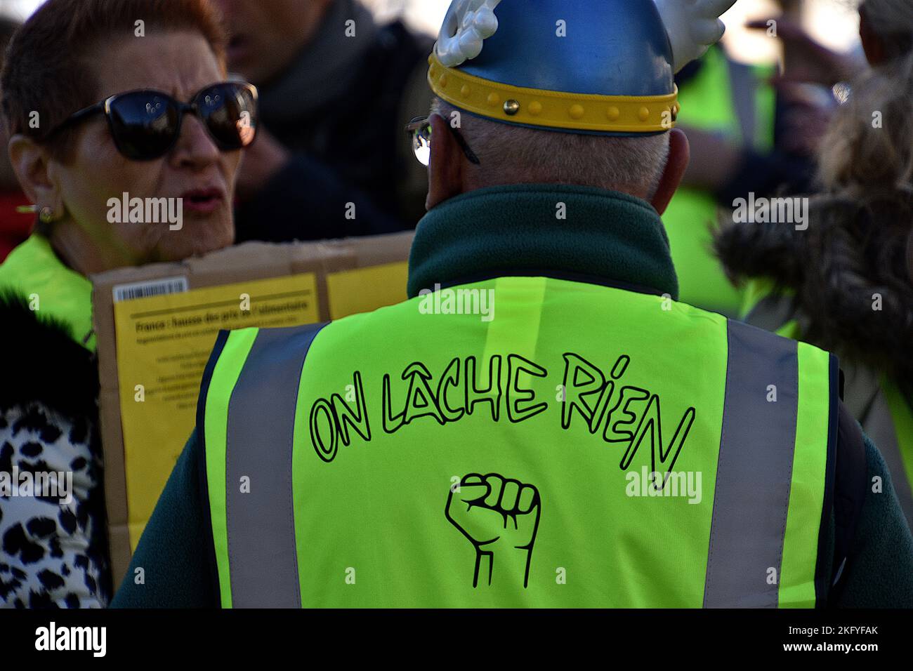 A protester seen wearing a yellow vest during the demonstration. The ...