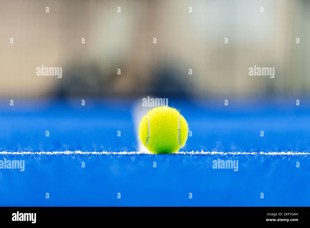 Paddle tennis and tennis ball on blue court. Horizontal sport poster ...