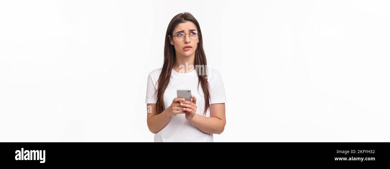 Communication, technology and lifestyle concept. Portrait of troubled ...