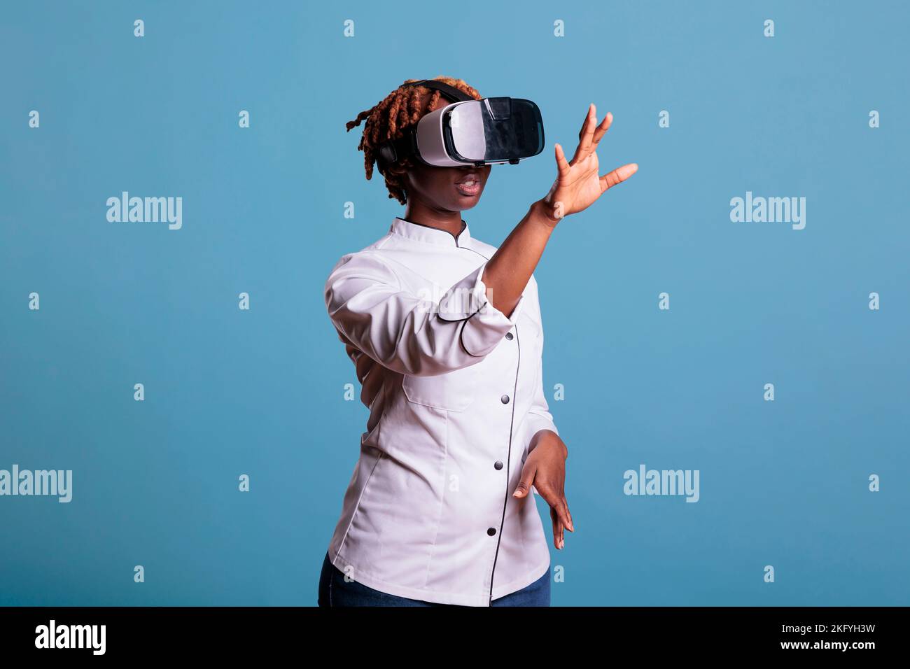African american girl restaurant worker wearing virtual reality goggles ...