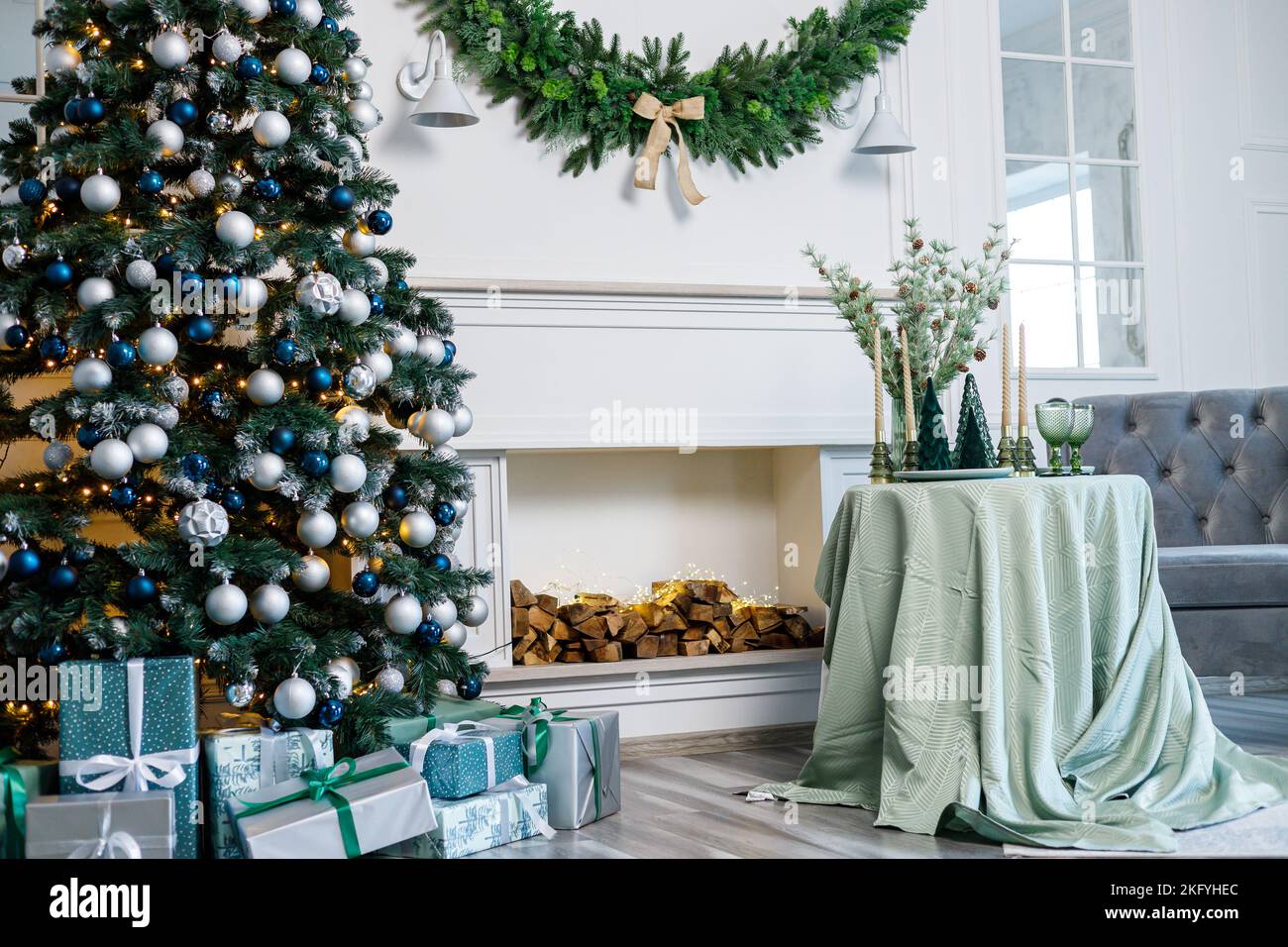 Table setting for Christmas or New Year's dinner with candles ...