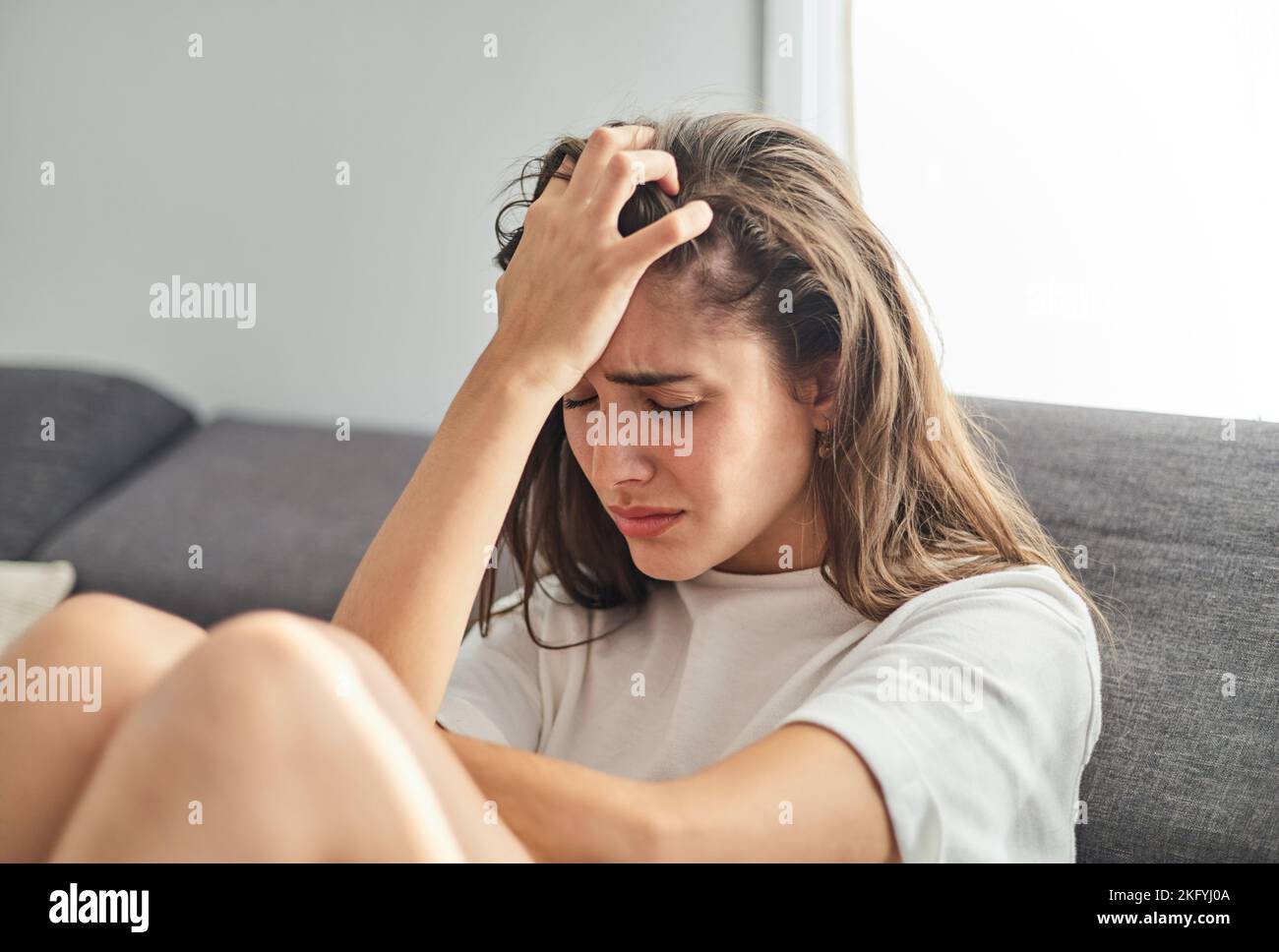Young woman crying hi-res stock photography and images - Alamy