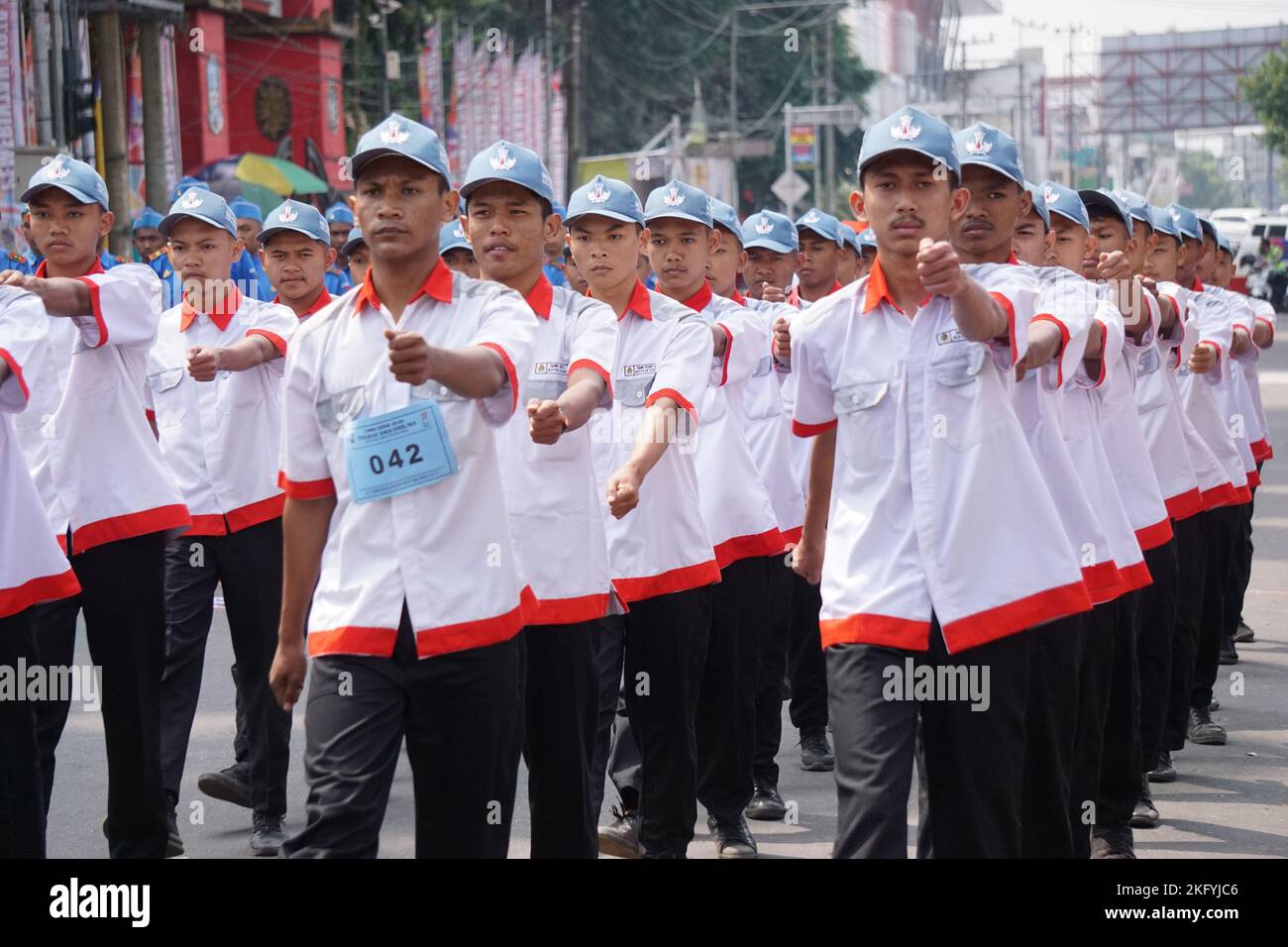 Indonesian senior high school students with uniforms, marching to ...