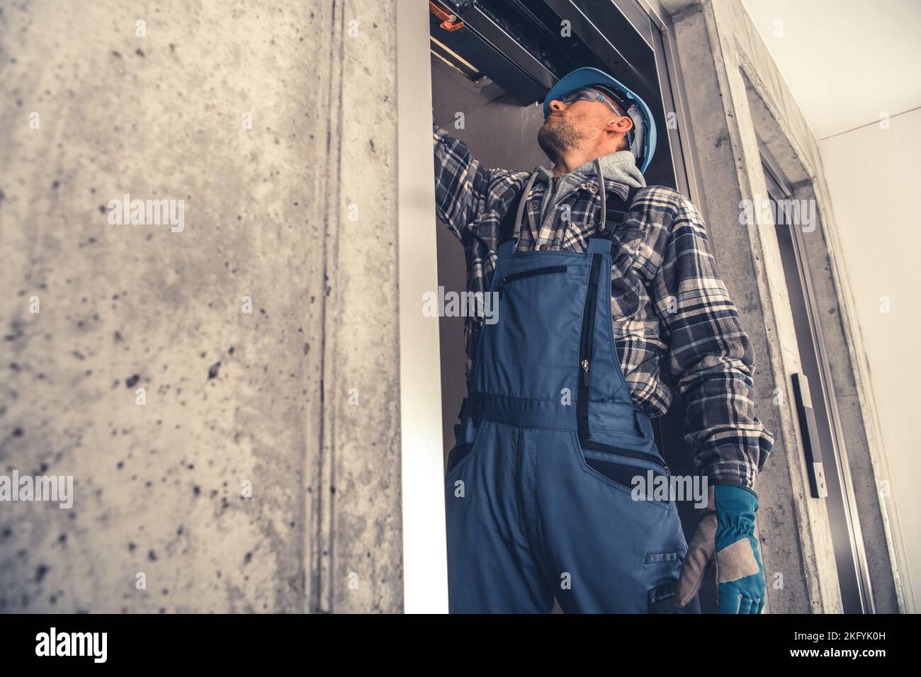 Residential Elevator Maintenance Performed by Professional Caucasian ...