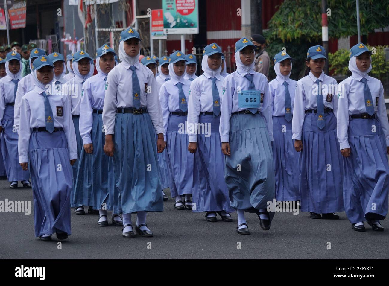 Indonesian senior high school students with uniforms, marching to ...