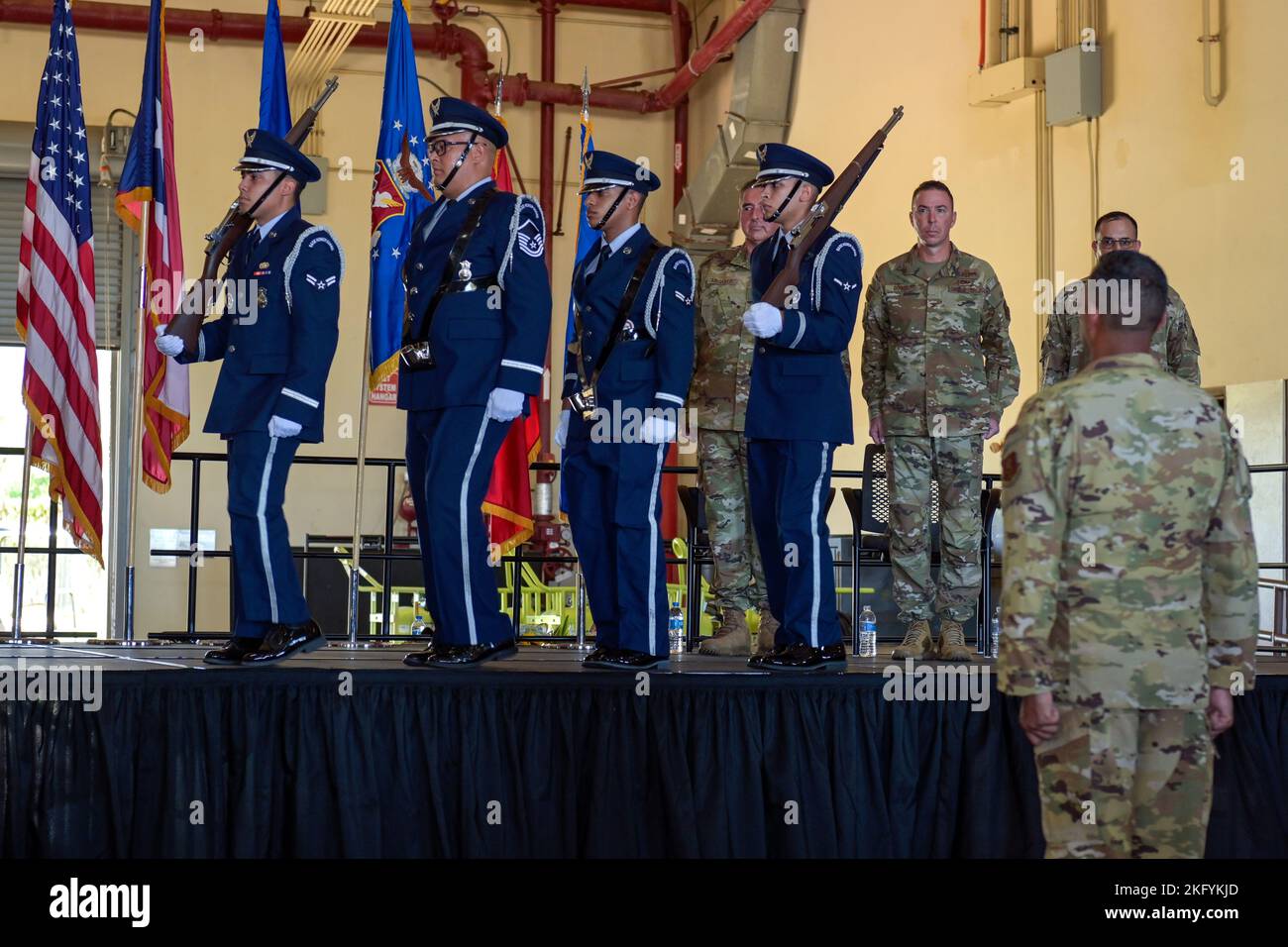 U.S. Airmen with the 156th Wing Honor Guard, march in formation during ...