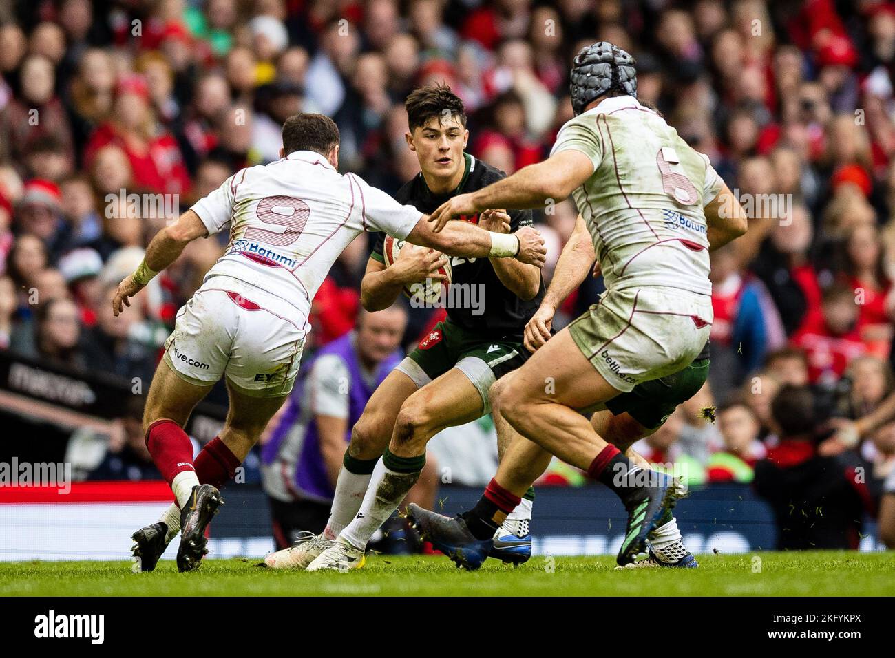 Louis Rees-Zammit of Wales under pressure from Vasil Lobzhanidze, Beka ...