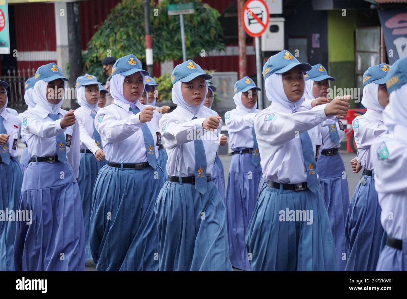 Indonesian senior high school students with uniforms, marching to ...