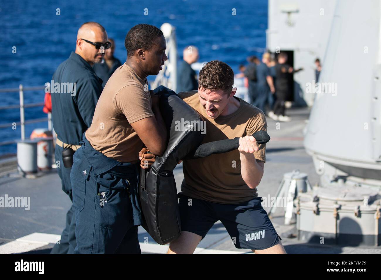 221015-N-LK647-1496 ATLANTIC OCEAN—Ens. Dane Hamilton, right, and Fire ...