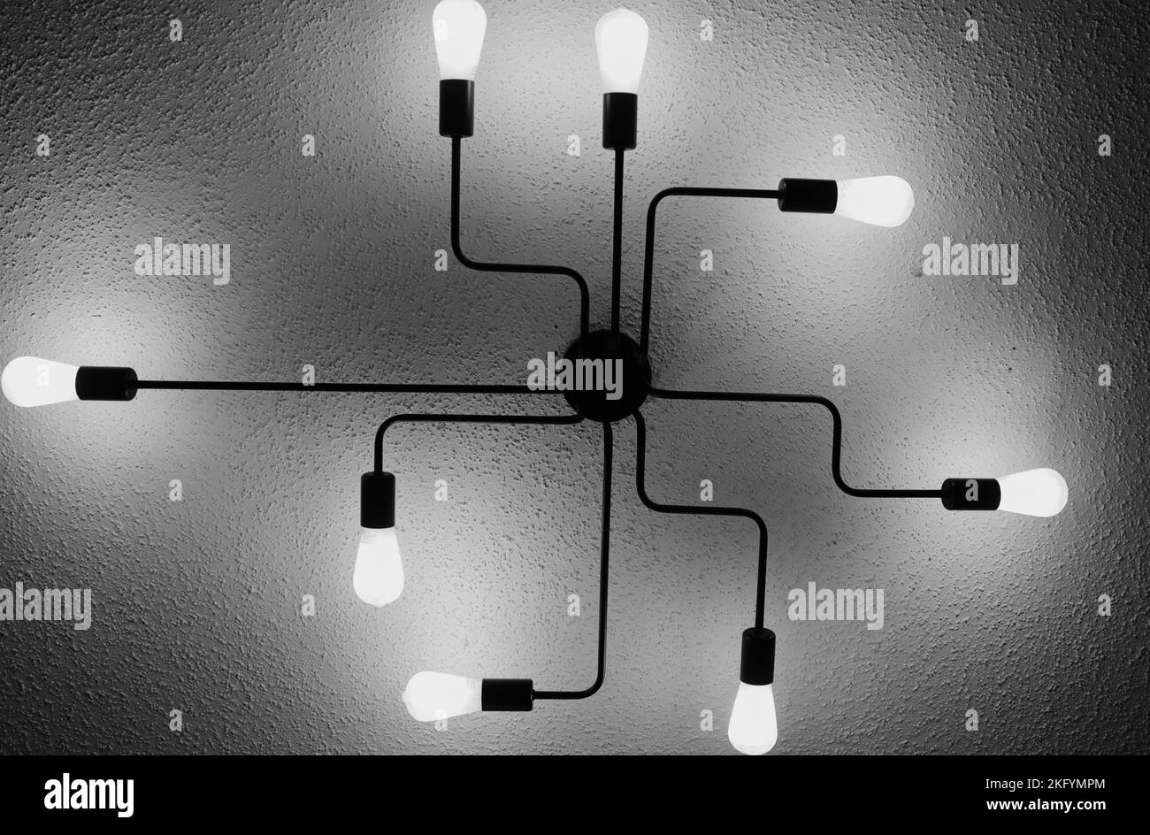 A grayscale of a vintage geometric light fixture Stock Photo - Alamy