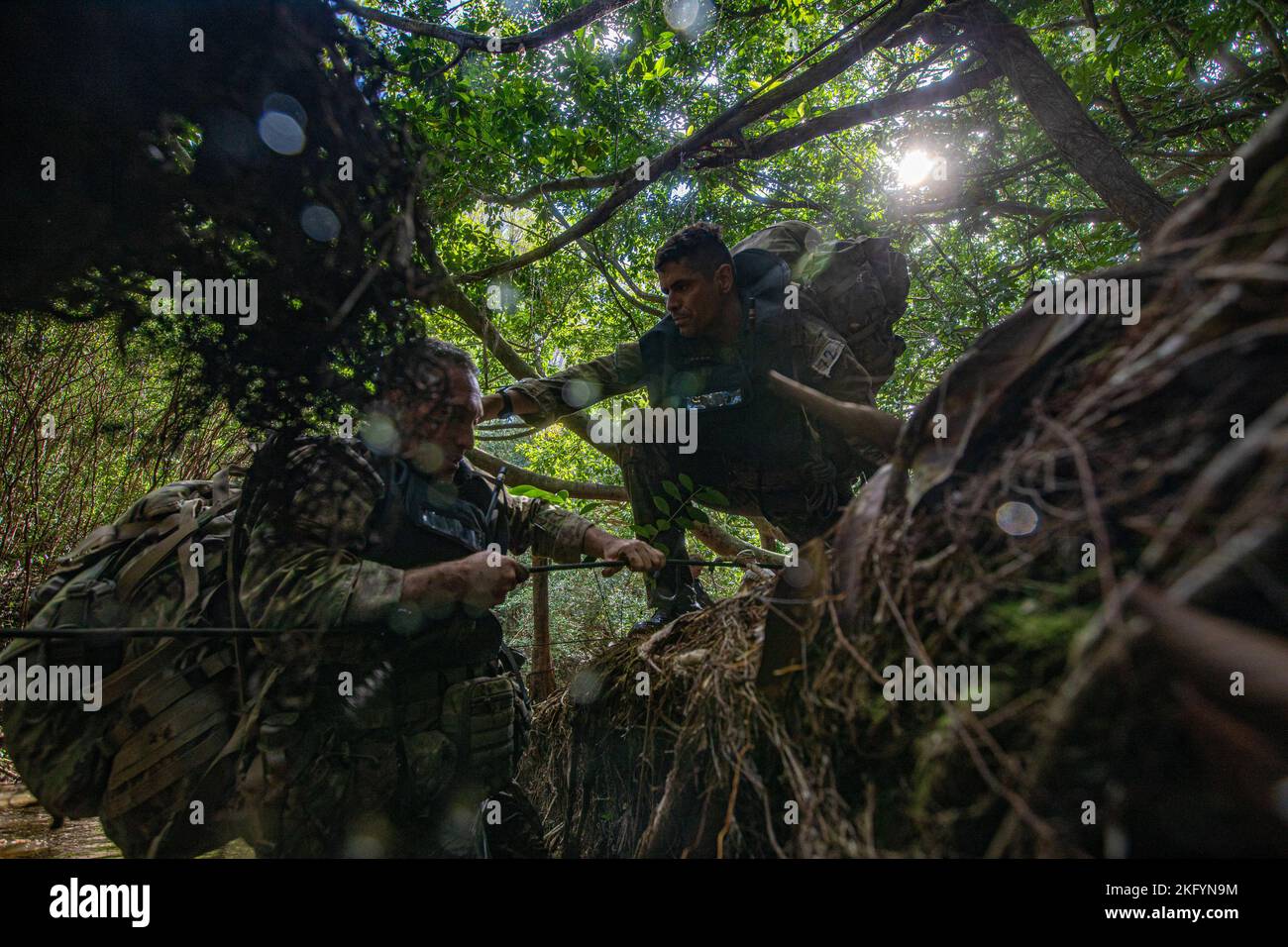 U.S. Army Soldiers participating in Jungle School perform waterborne ...