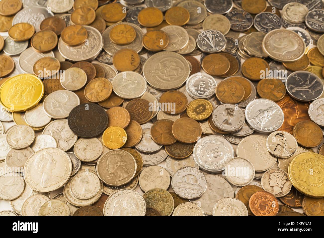 Old US, Canadian and foreign coins Stock Photo - Alamy
