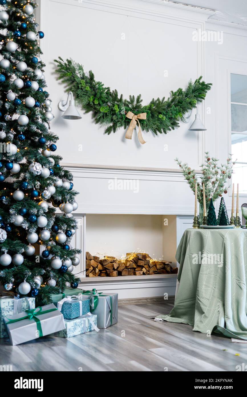 Table setting for Christmas or New Year's dinner with candles ...