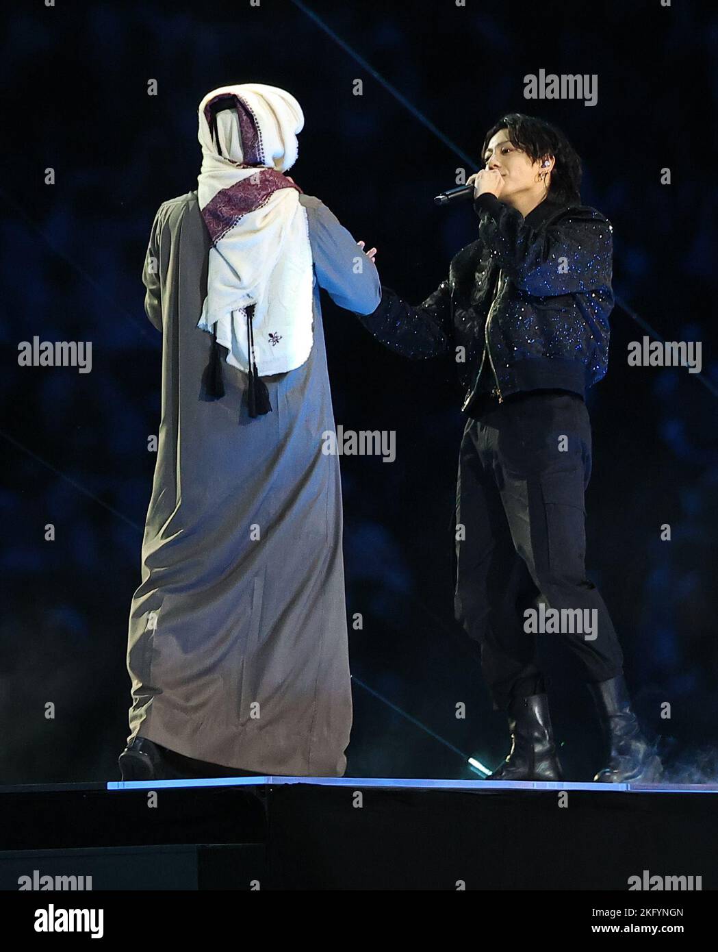 21st Nov, 2022. World Cup in Qatar Jungkook (R), a member of South ...