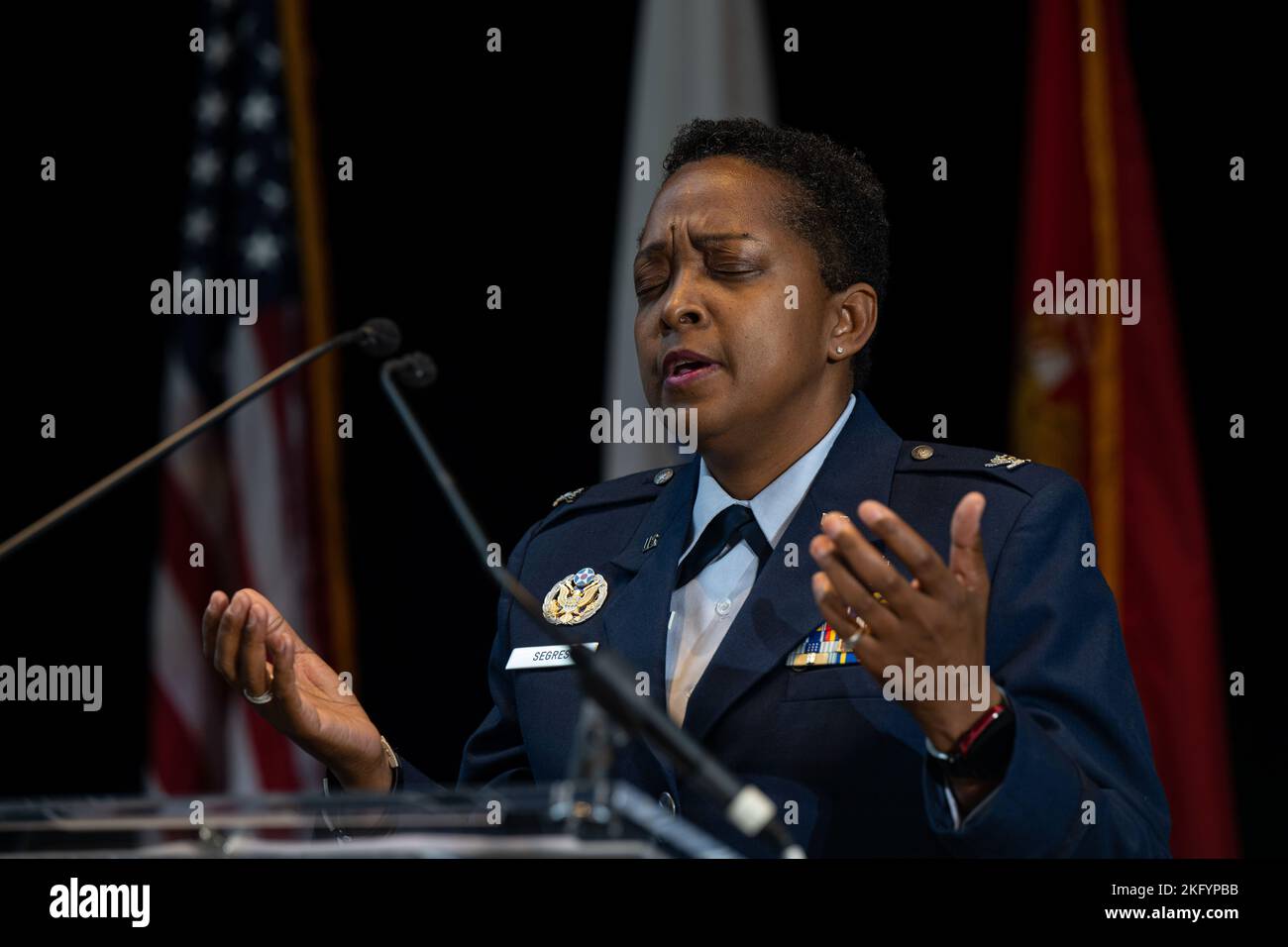 Air Force Col. Ruth N. Segres delivers the benediction to conclude the ...