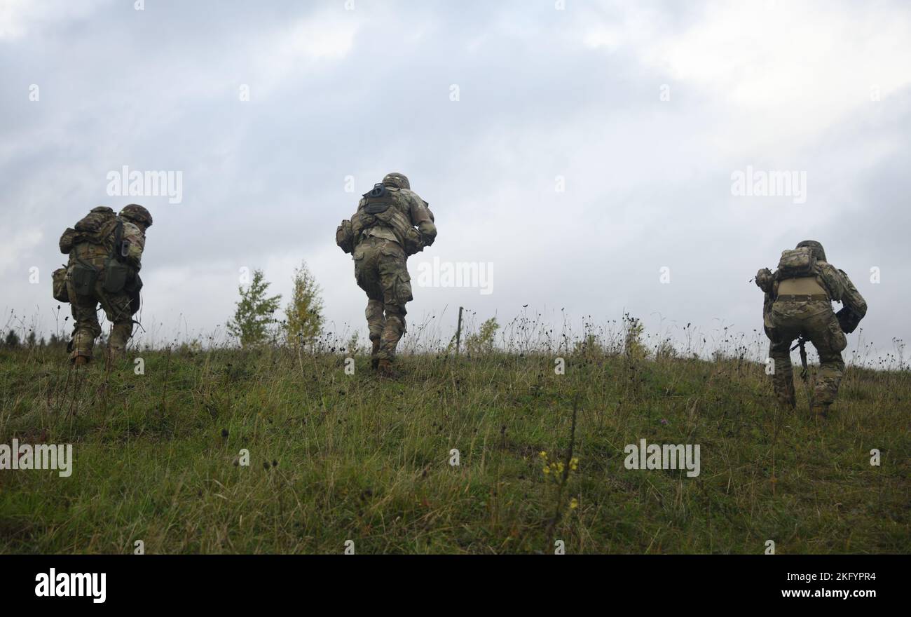 U.S. Soldiers assigned to 1st Squadron, 2nd Cavalry Regiment crest over ...