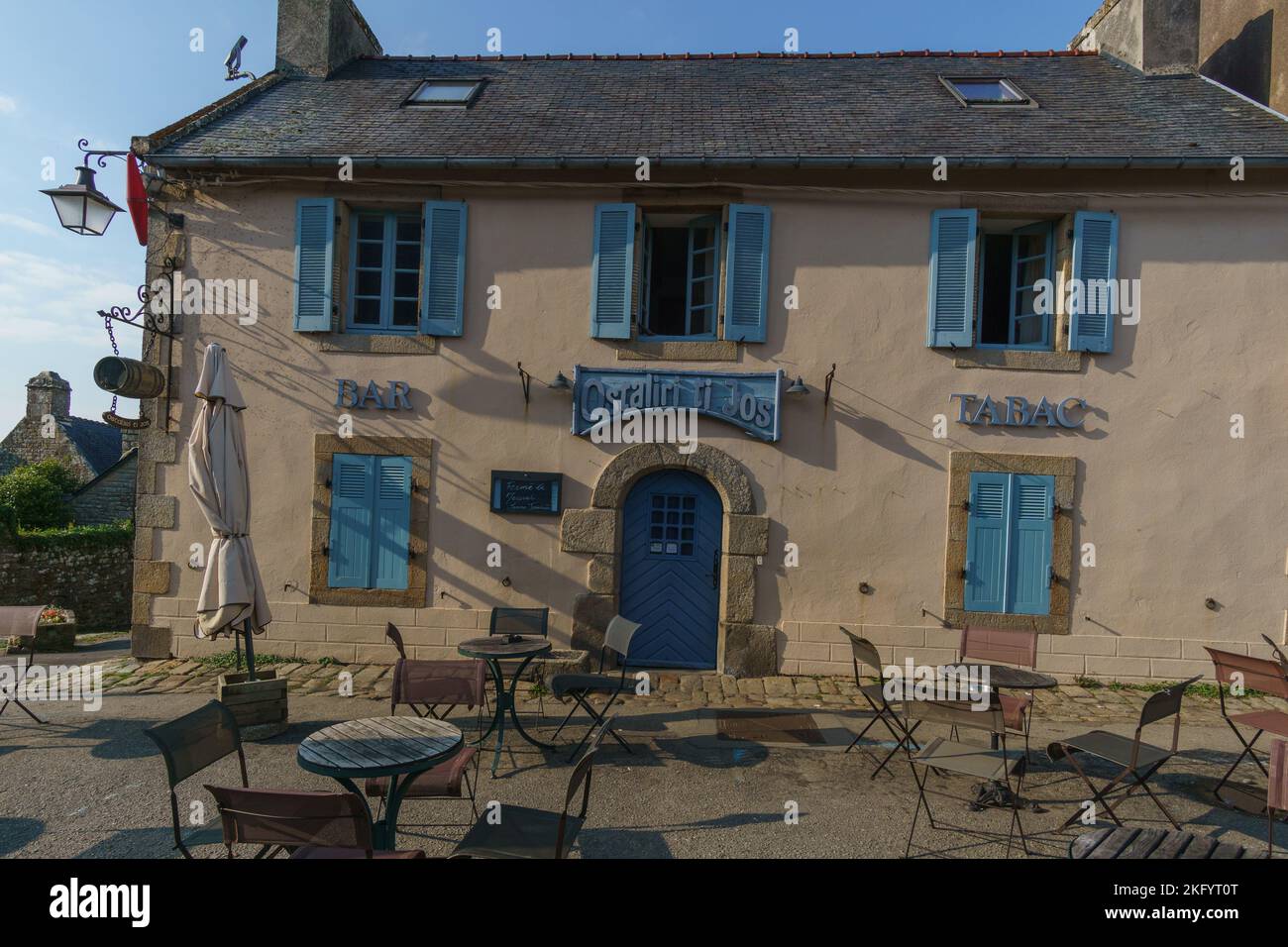 Medieval cafe house with tables in front in the small beautiful village ...
