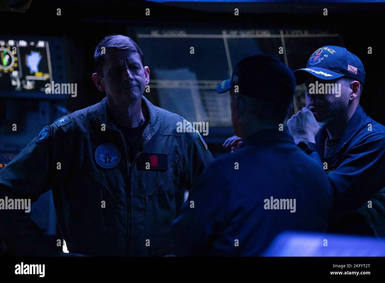 Rear Adm. Greg Huffman, left, Commander, Carrier Strike Group 12, tours ...