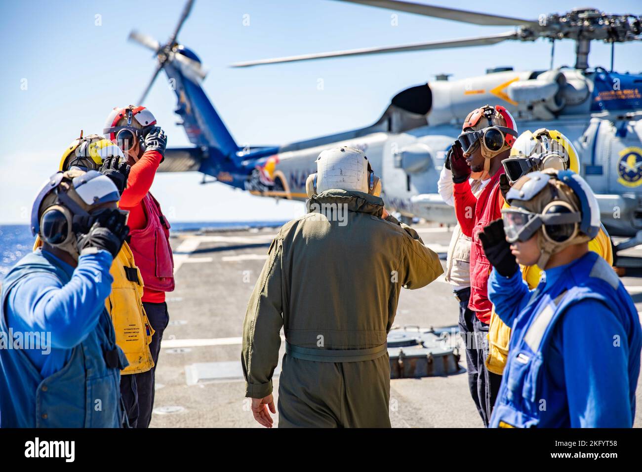 Sideboys assigned to the Arleigh Burke-class guided-missile destroyer ...