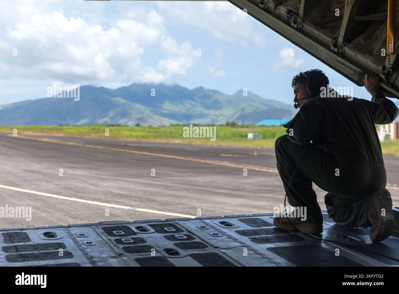 U.S. Marine Corps Cpl. Michael Elliott, a loadmaster with Marine Aerial ...