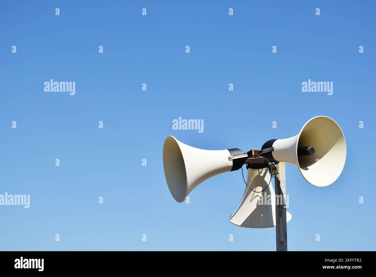 Old weathered vintage public address (PA) megaphone system loudspeaker ...