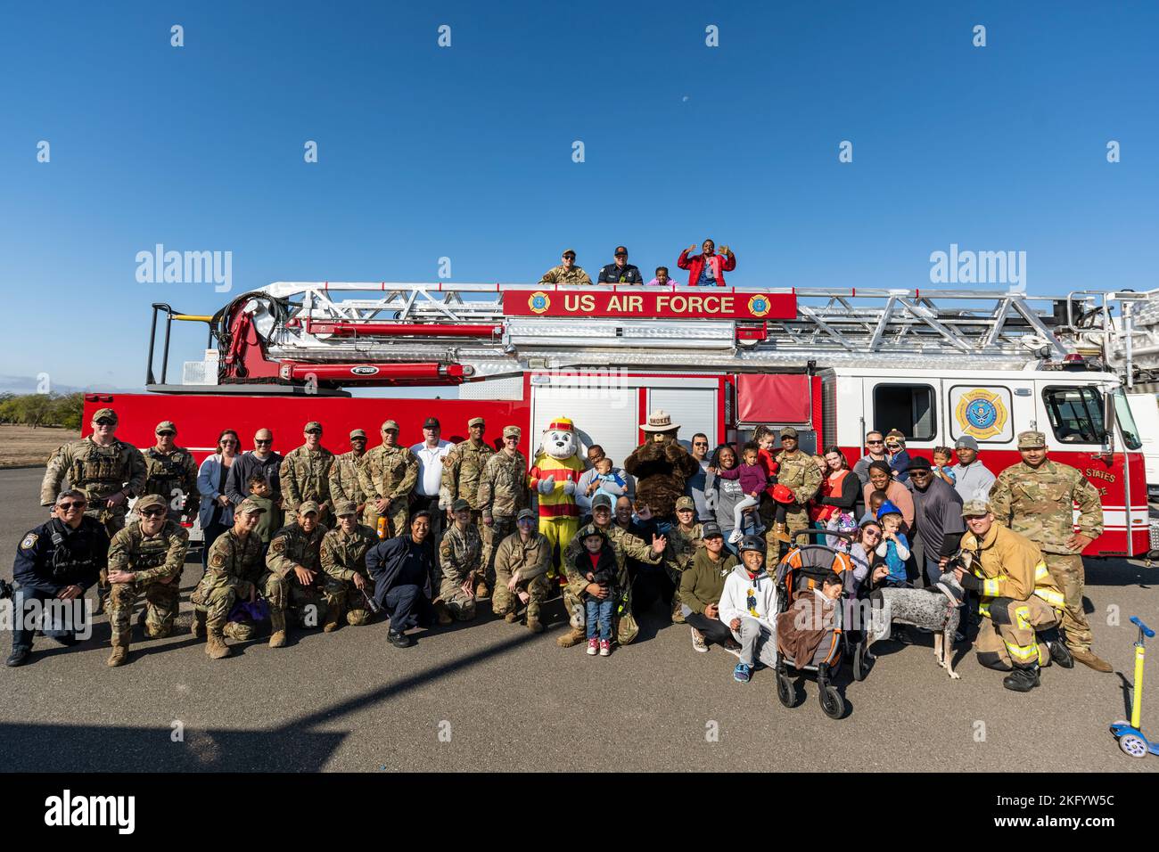 U.S. Airmen from the 60th Civil Engineer Squadron and family members ...