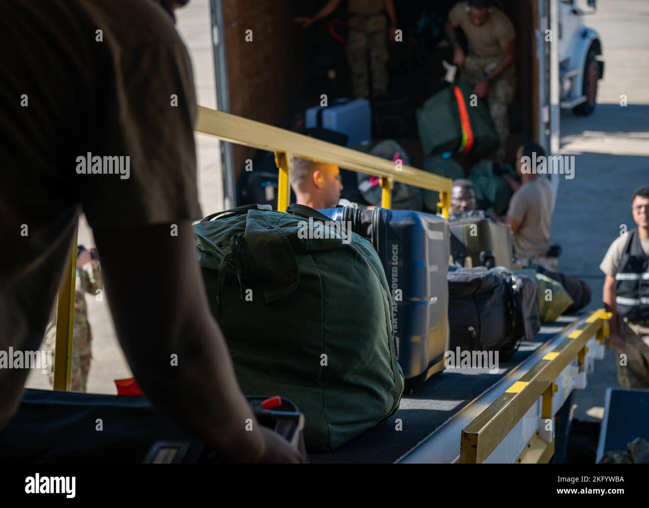 U.S. Air Force Airmen assigned to the 20th Fighter Wing load cargo for ...