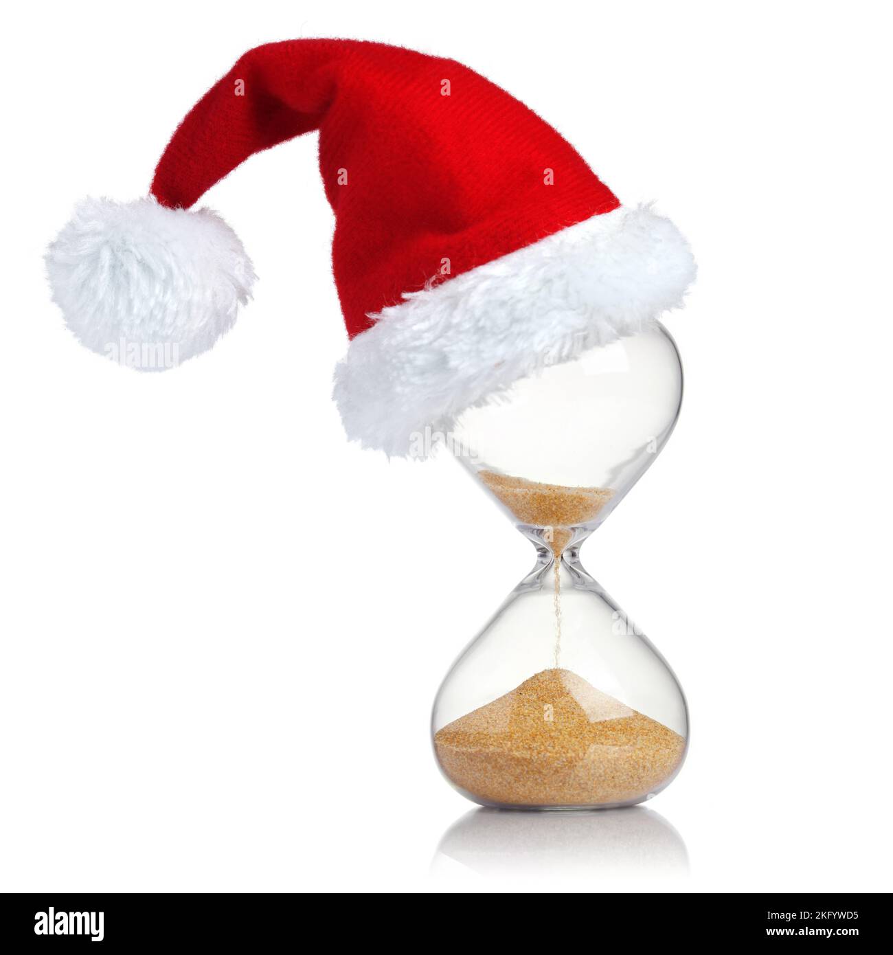 Hourglass with Christmas Santa hat showing the passage of time Stock ...