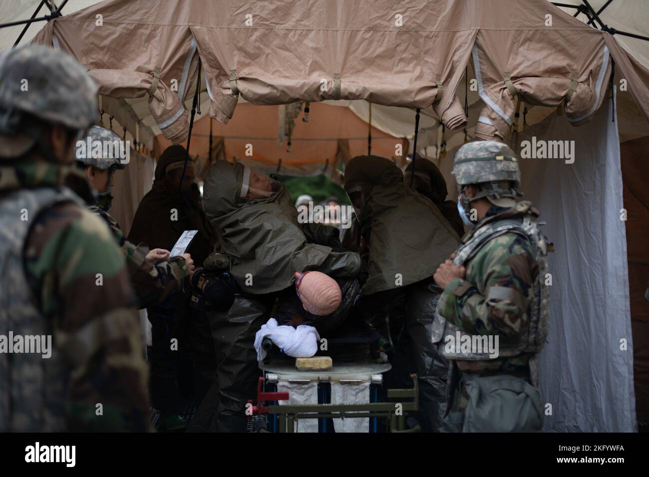 Airmen from the 374th Medical group simulate mass casualty treatment ...