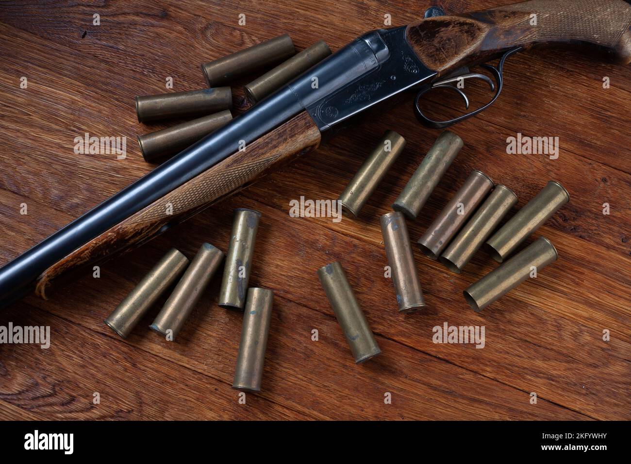 Antique 16-gauge break-action smooth-bored shotgun with cartridges. on ...