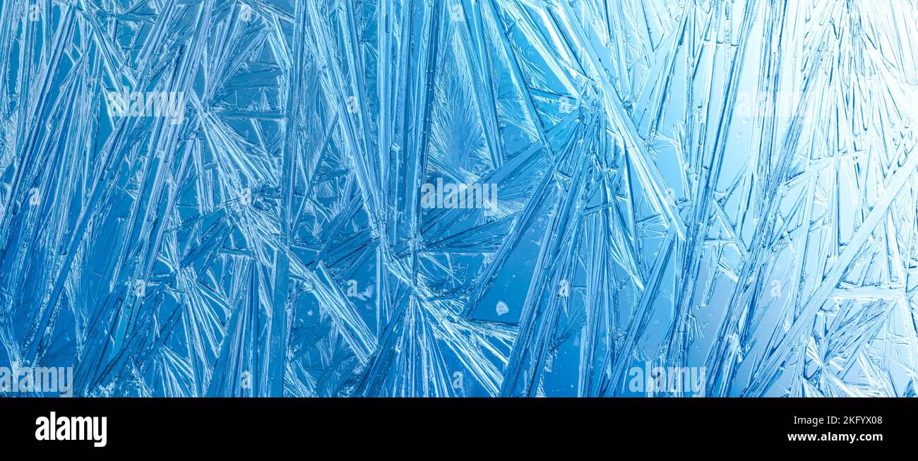 Winter frost covered window with a pattern of ice crystals Stock Photo ...