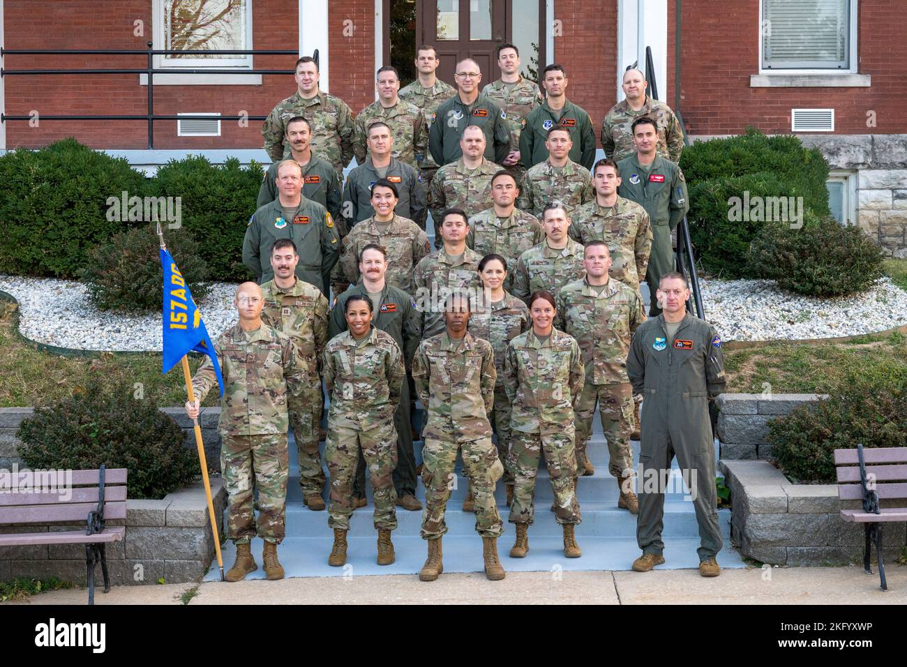 Members of the 157th Combat Operations Squadron stand for a group photo ...