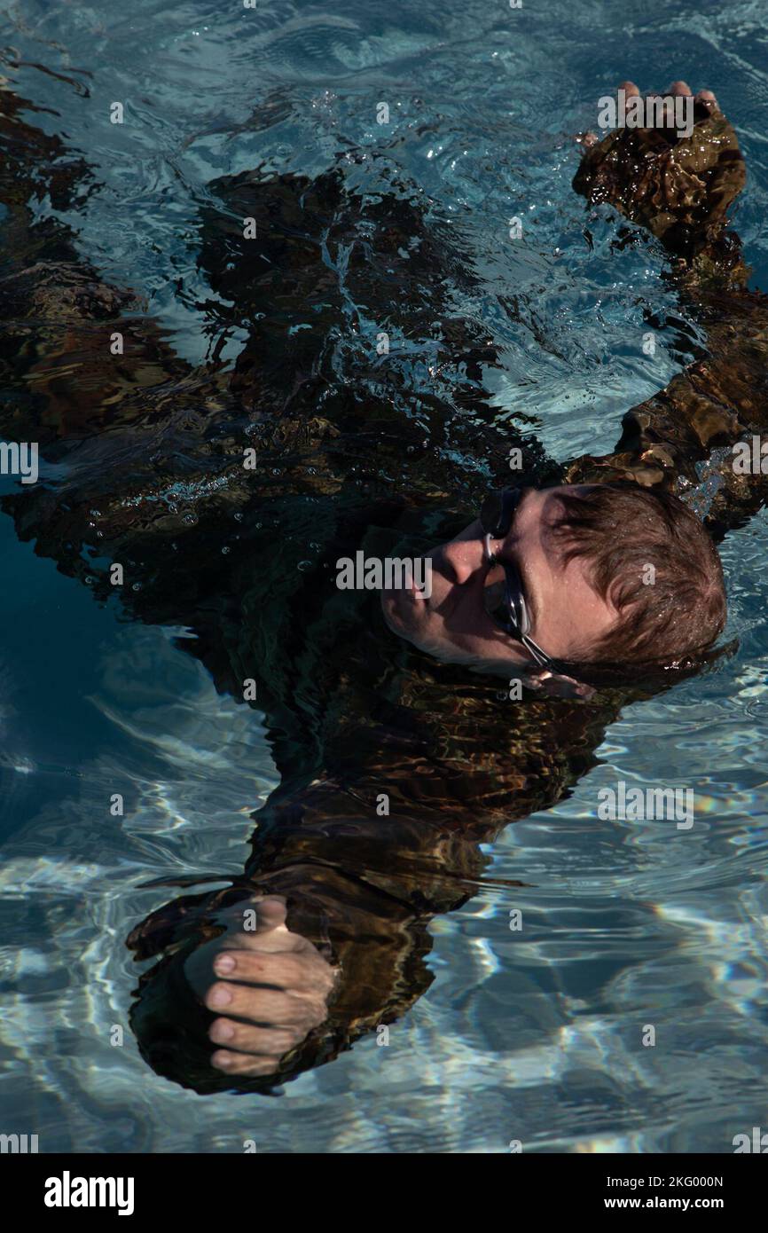 Spc. Jeffery Wells with 97th Aviation Troop Command, reaches for the ...