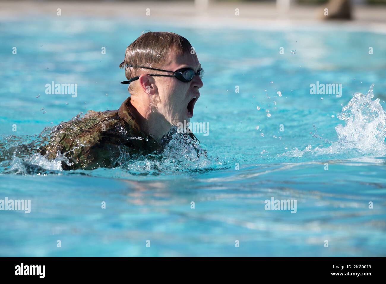 Staff Sgt. Nathan Woods with 97th Troop Command, emerges for a breath ...