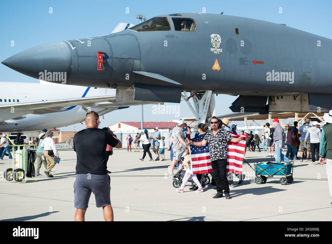 A B-1B Lancer fan poses in front of the "Bone" during the 2022 ...