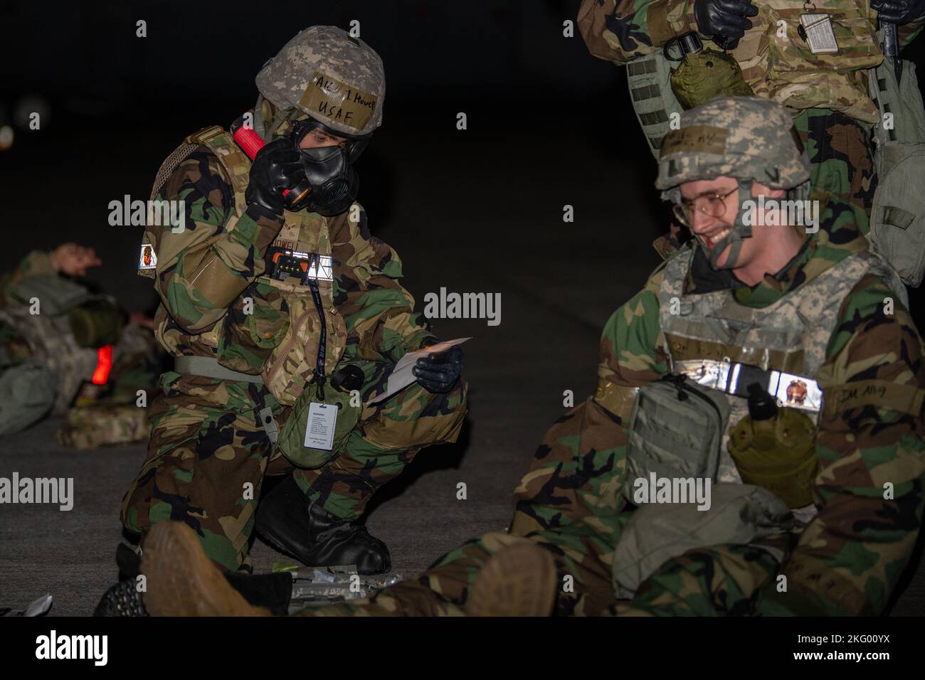 A 374th Airlift Wing Airman reads a simulated injured Airman’s Tactical ...