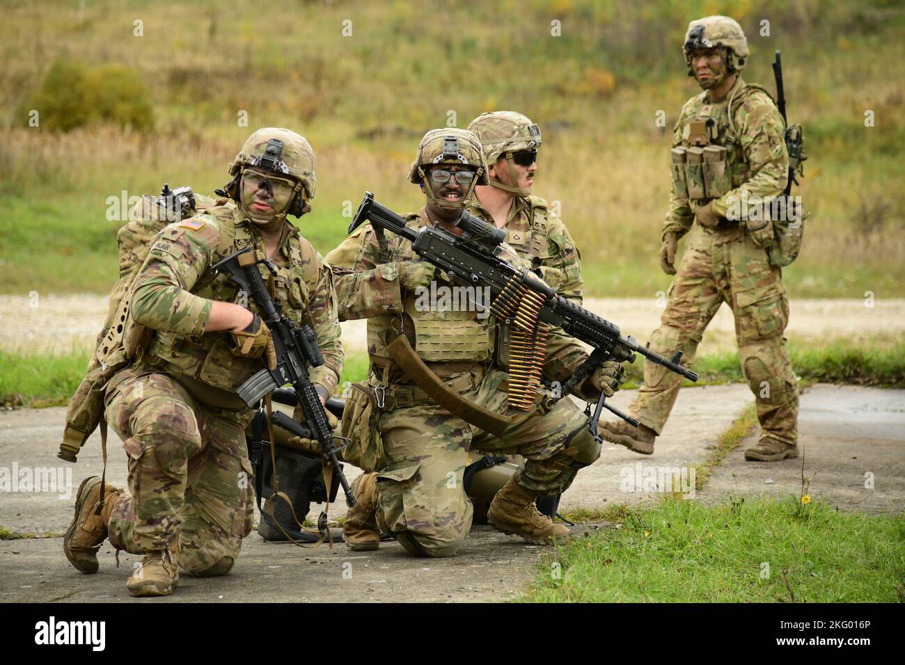 U.S. Spc. Branden Blair, Spc. Beniam Clark, and Pfc Logan Moore ...