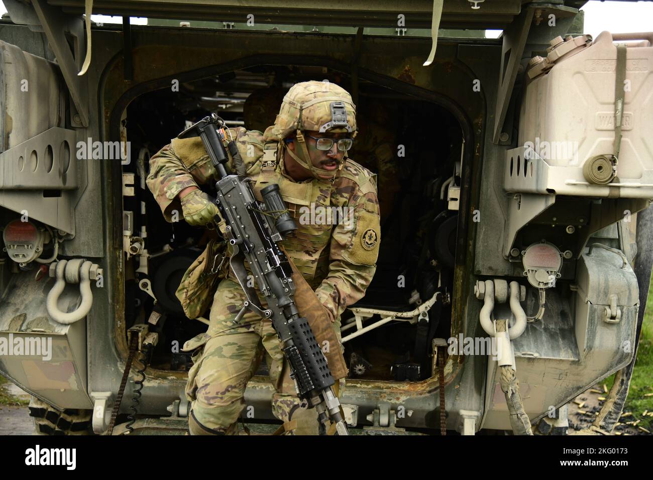 A U.S. Army Spc. Beniam Clark, a M240b gunner assigned to Bull Troop ...