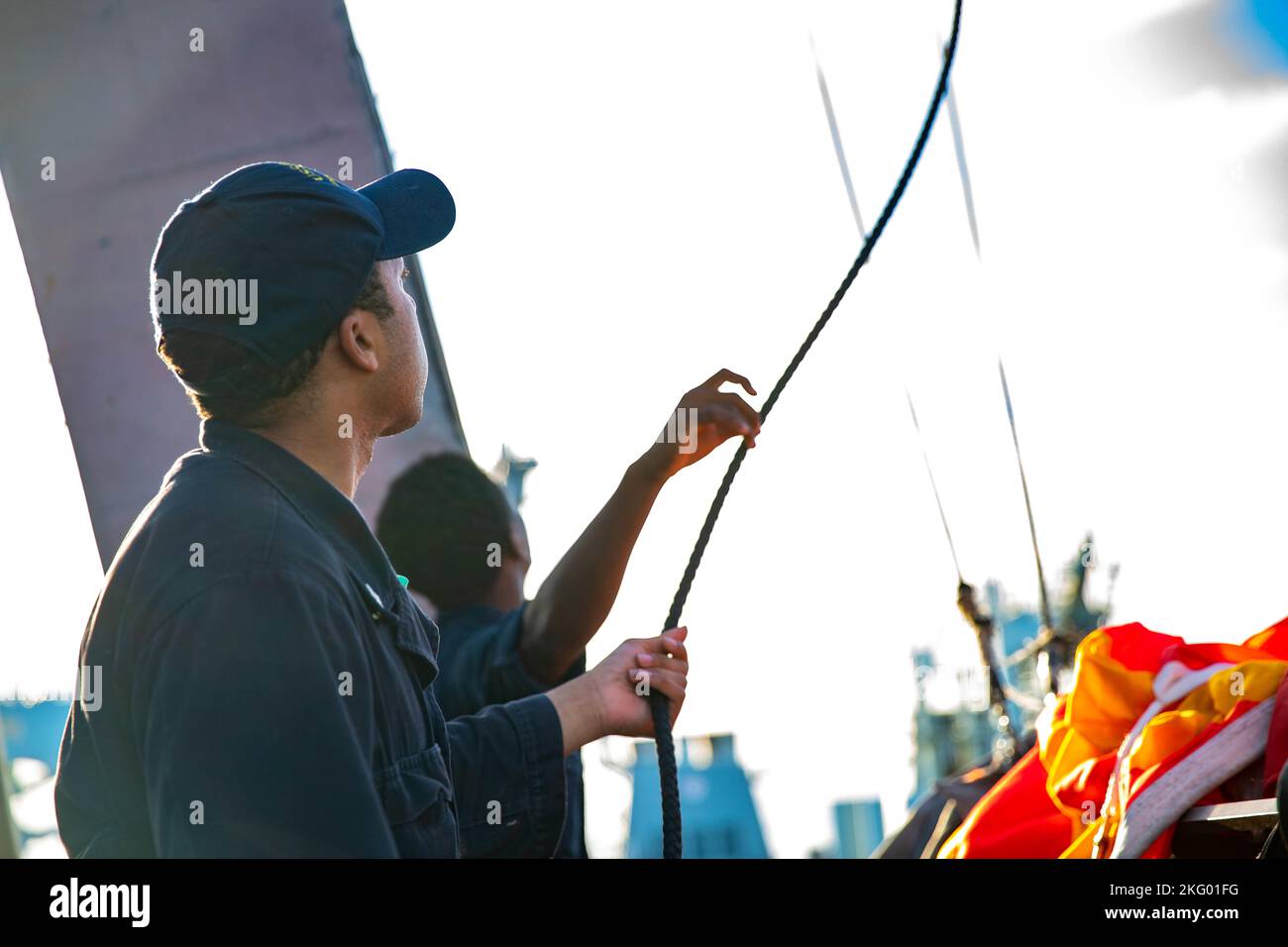 Quartermaster 2nd Class Kaiser Chowdhury, left, assigned to the Arleigh ...