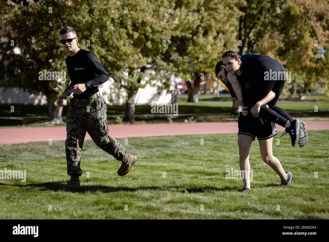 U.S. Marine Corps Sgt. Rhett Laninga (left), a recruiter with ...