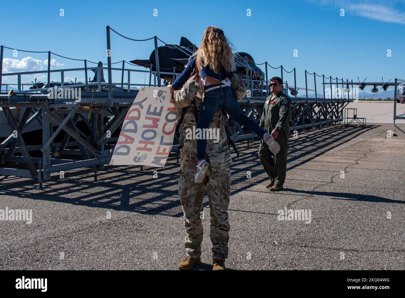 Family and friends greet redeploying members assigned to the 355th Wing ...