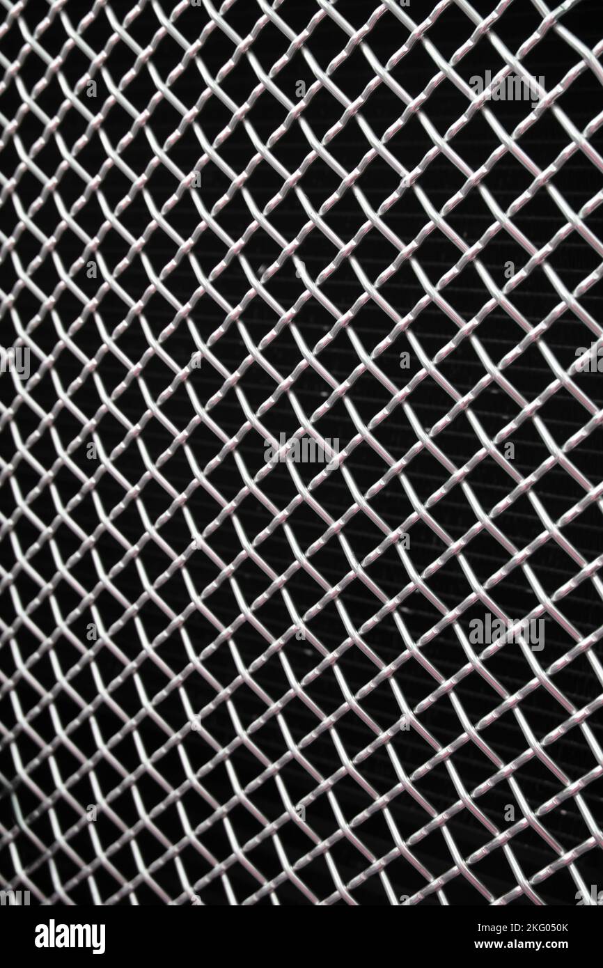 diamond shapped fence grill pattern in metal stainless steel Stock ...
