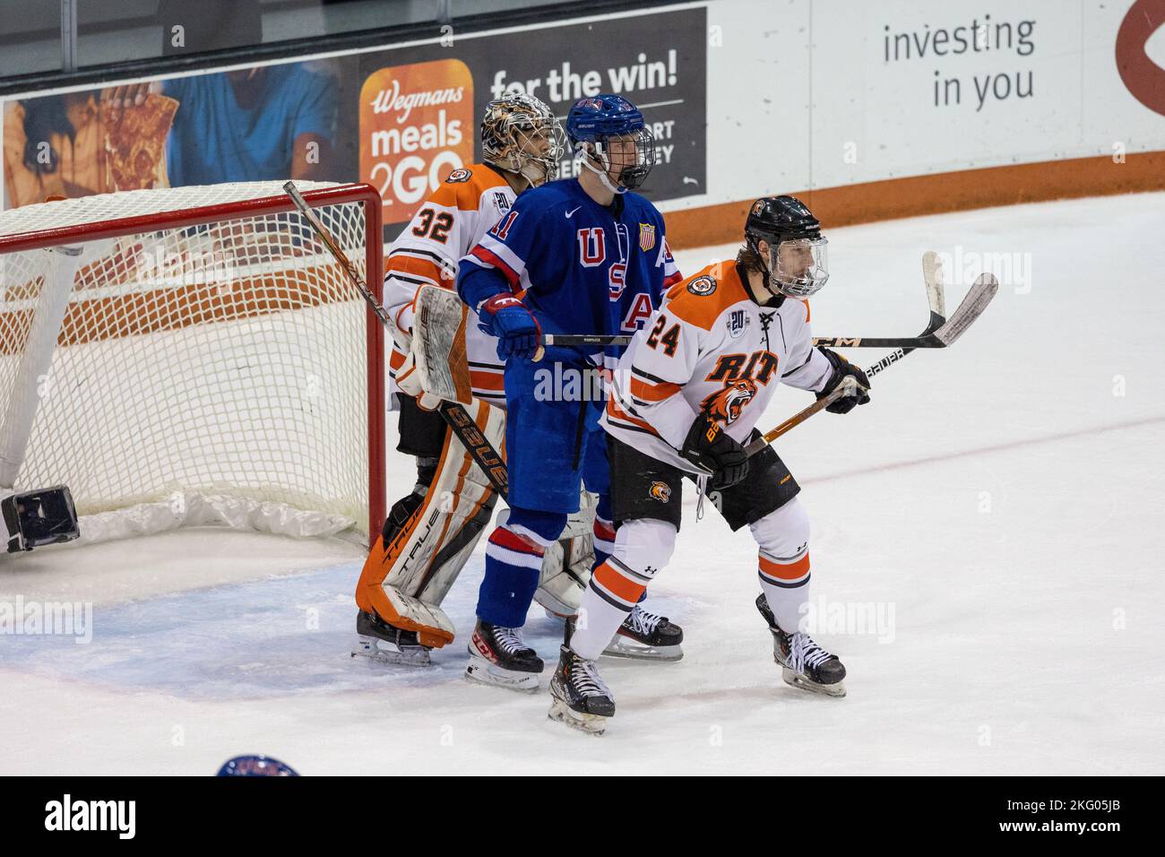 November 19, 2022: Team USA forward Oliver Moore (11) and RIT Tigers ...